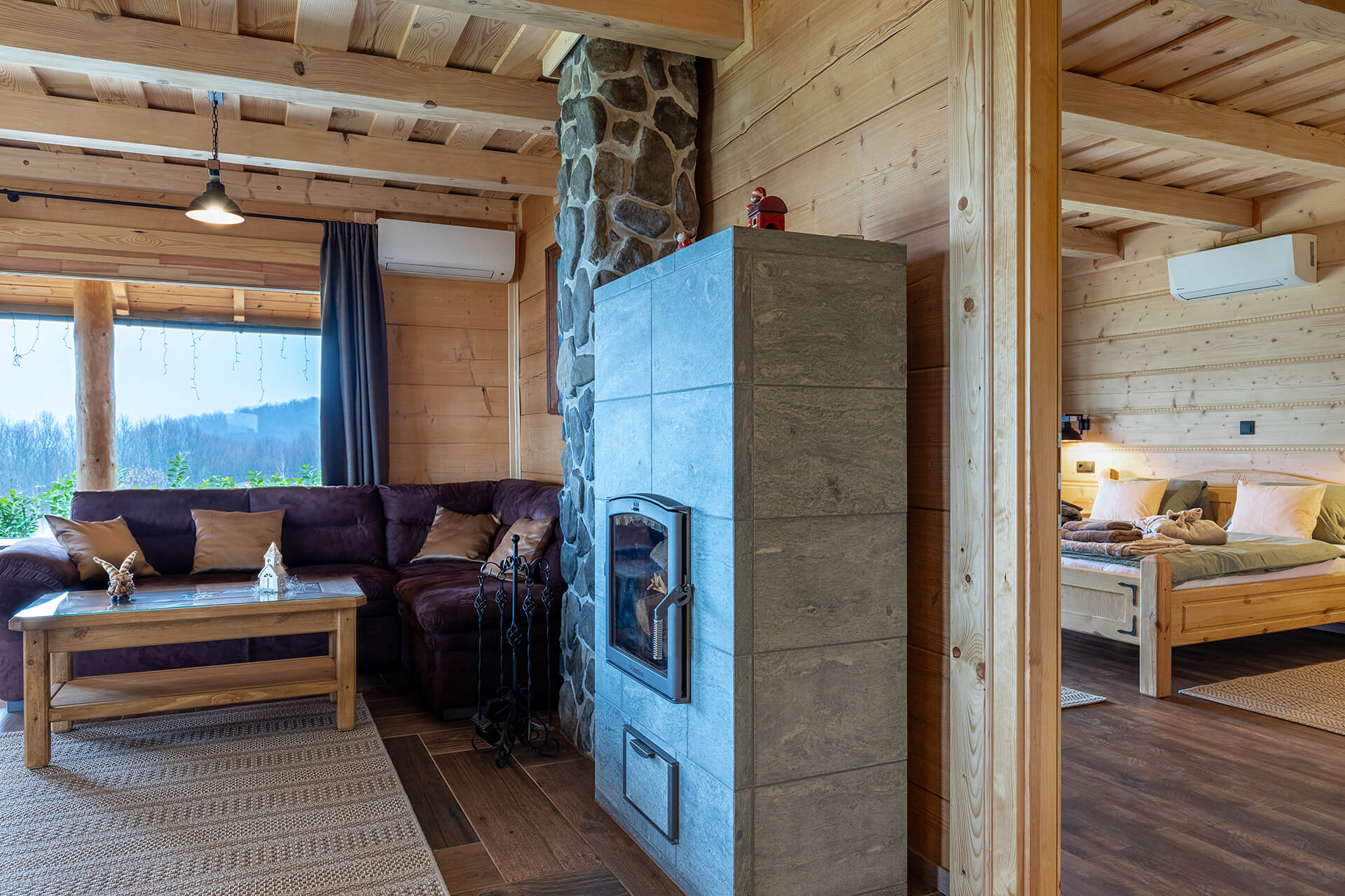 Rólunk - Hanga Prémium Rönkház